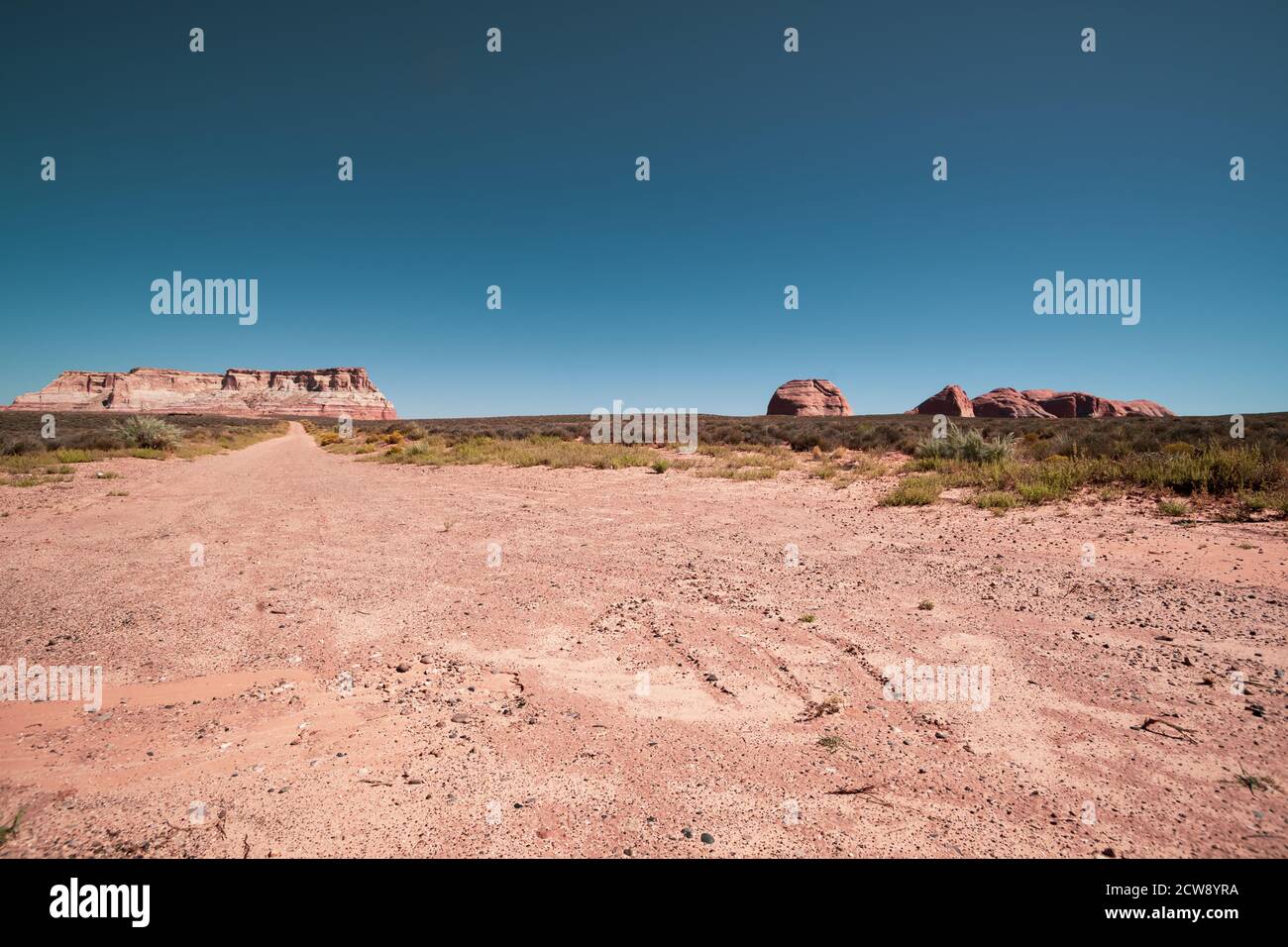 Wide flat desert plains in Arizona with plateau top mesa and other rock ...