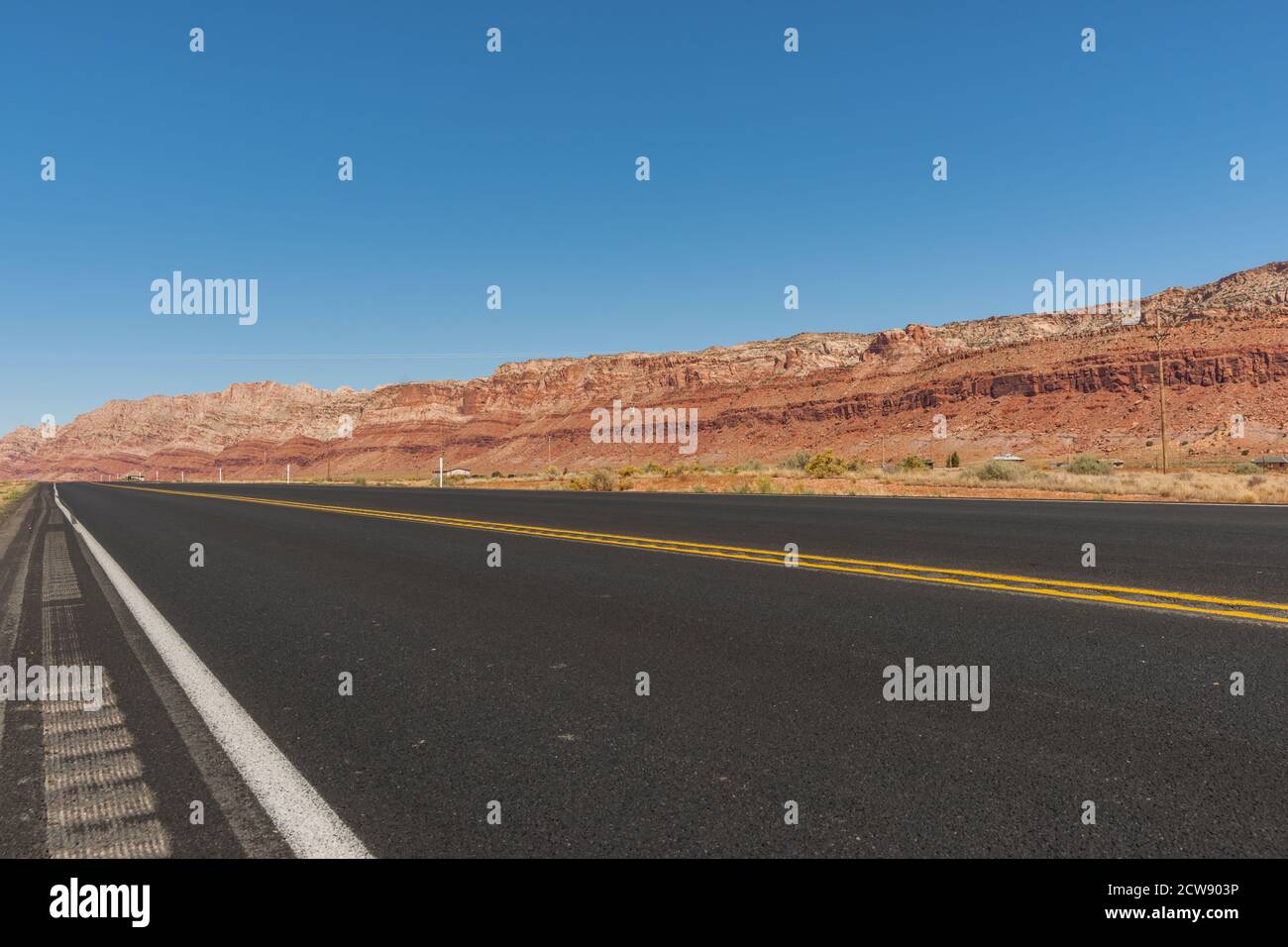 Road travelling through desert and red rock areas of Arizona with road ...