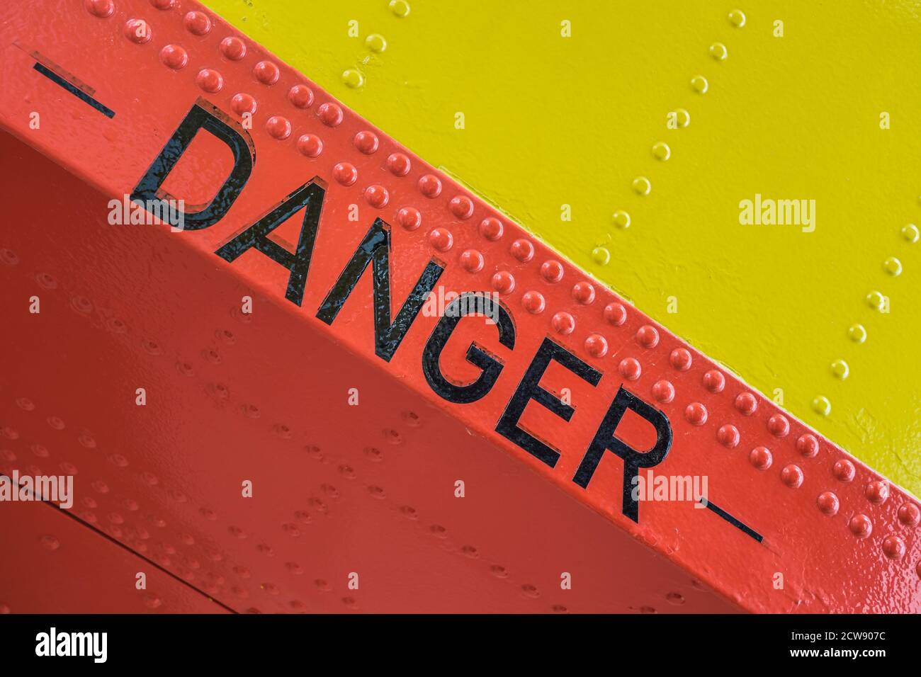 danger sign on a fire fighter plane Stock Photo - Alamy