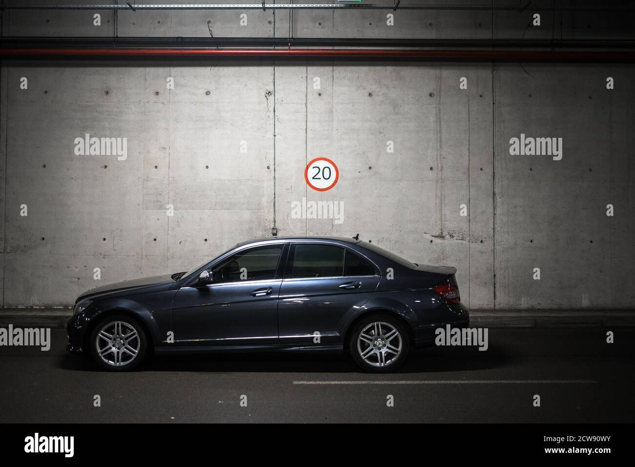 Fast car in a parking lot Stock Photo - Alamy