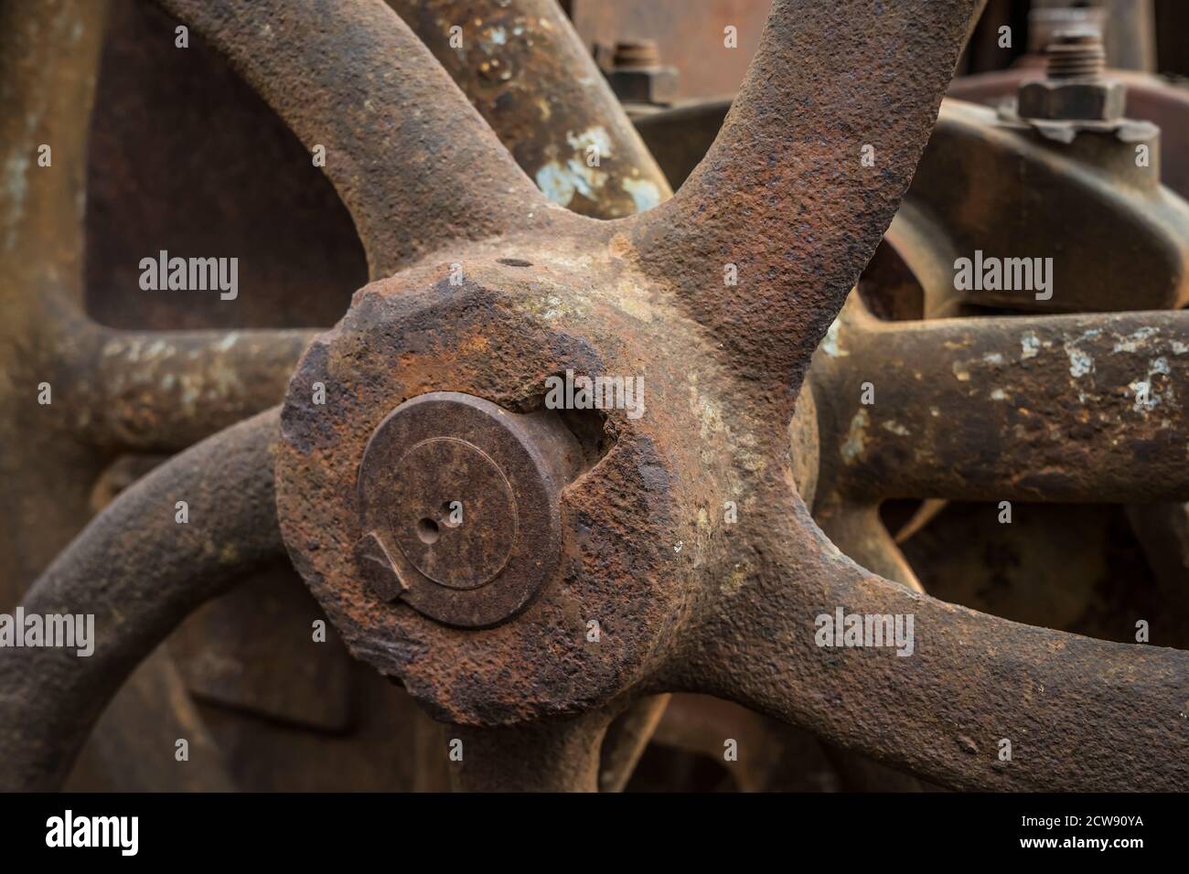 rusty wheel hub of a historic machine Stock Photo - Alamy