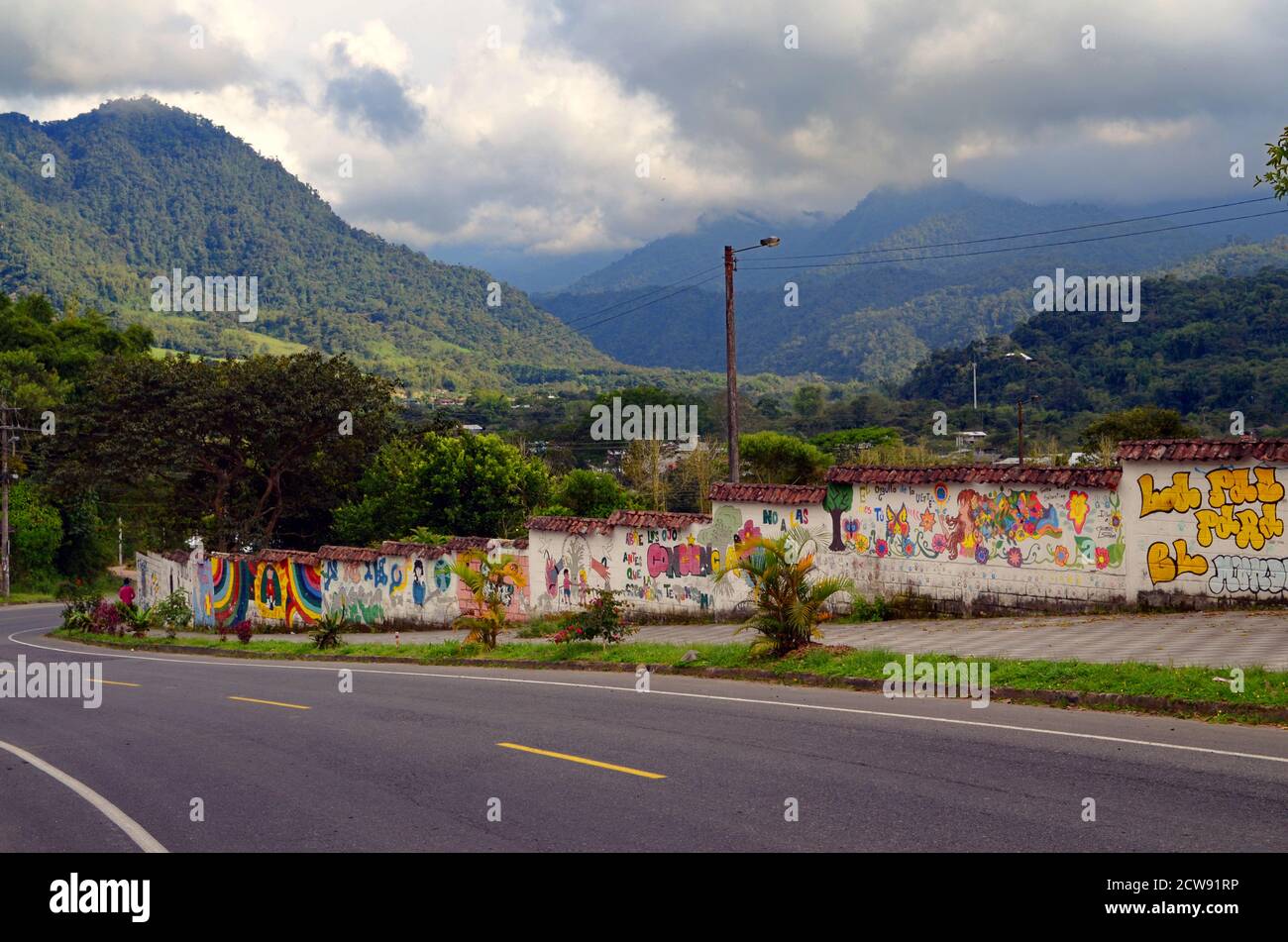 Ecuador - Mindo Road with Graffiti Wall Stock Photo - Alamy