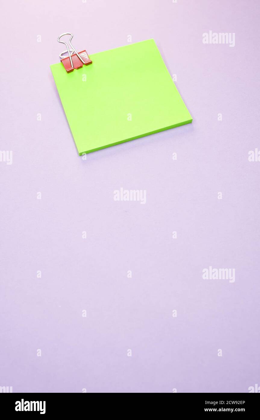 Vertical shot of sticky notes and paper clip Stock Photo - Alamy