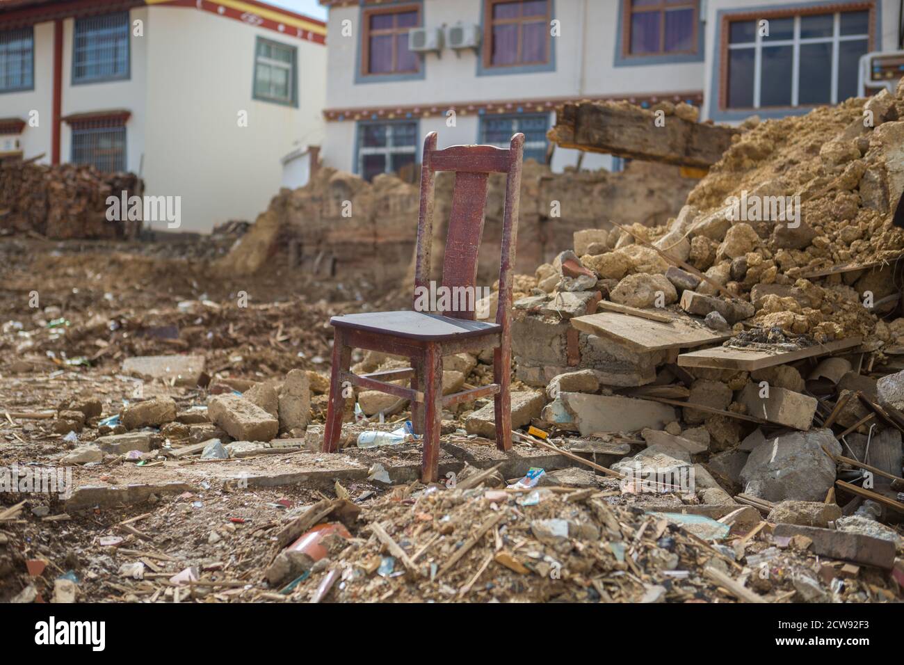 Chair among rubble after a fire in China Stock Photo - Alamy