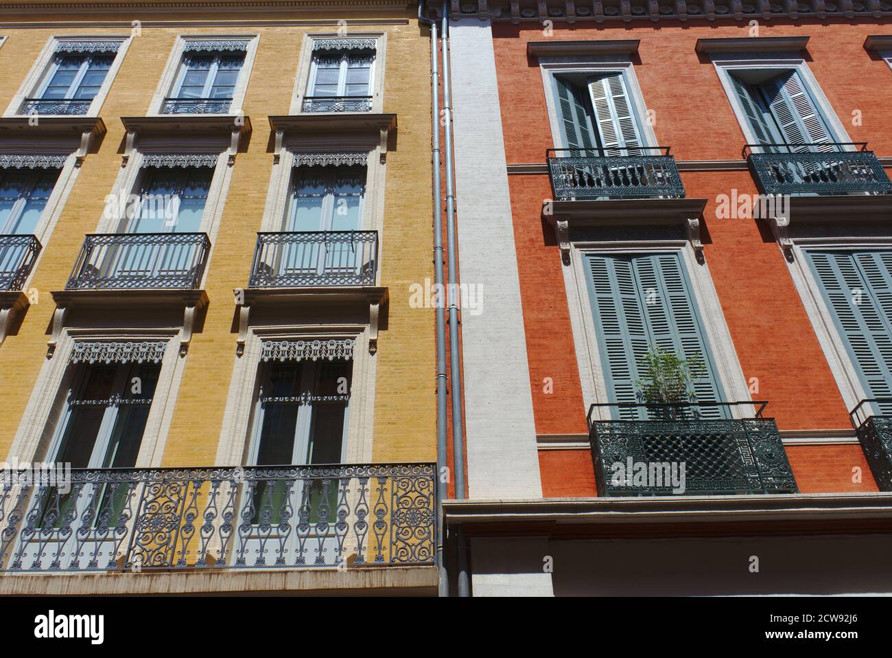 Toulouse, facades of houses in the city center, in local colors, yellow ...