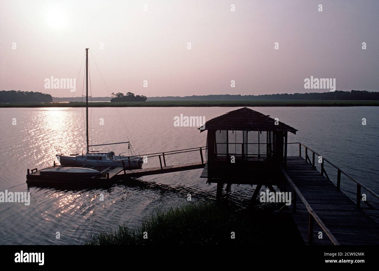 SAILING BOAT MOORED ON ONE OF MANY SAVANNAH RIVER CREEKS PONTOON ...