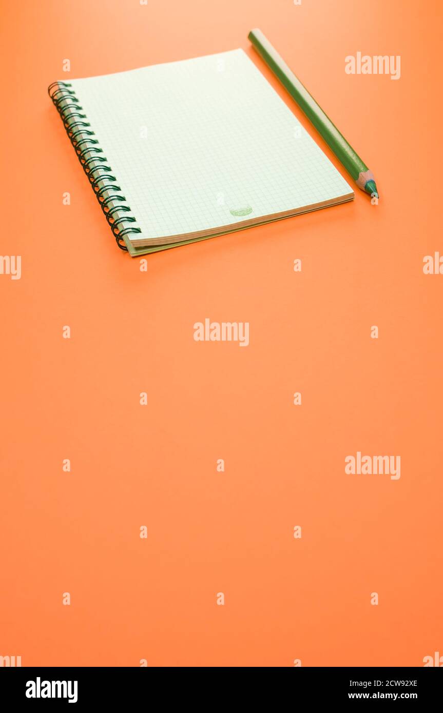 Vertical shot of a blank notebook and a pencil Stock Photo - Alamy
