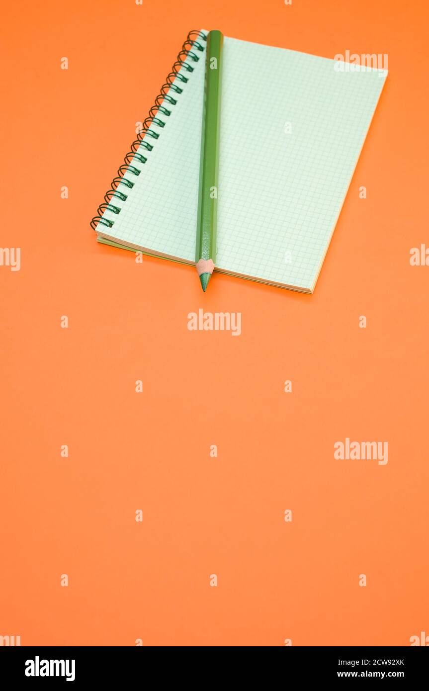 Vertical shot of a blank notebook and a pencil Stock Photo - Alamy