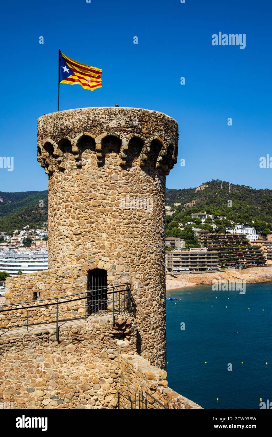 The Catalan independence flag flying from the medieval castle walls in ...