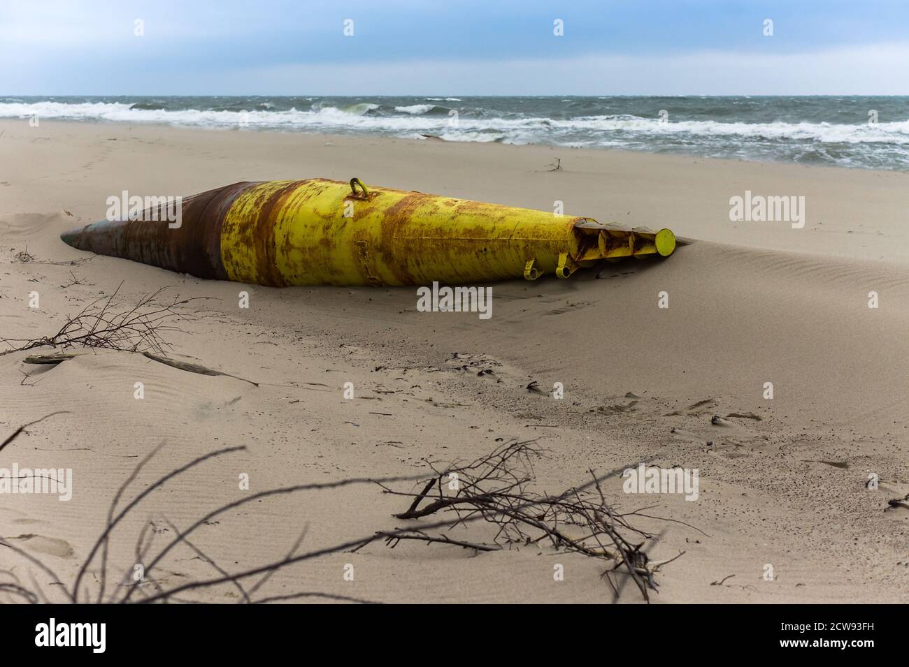 old iron float on the shore, sea buoy made of iron Stock Photo - Alamy