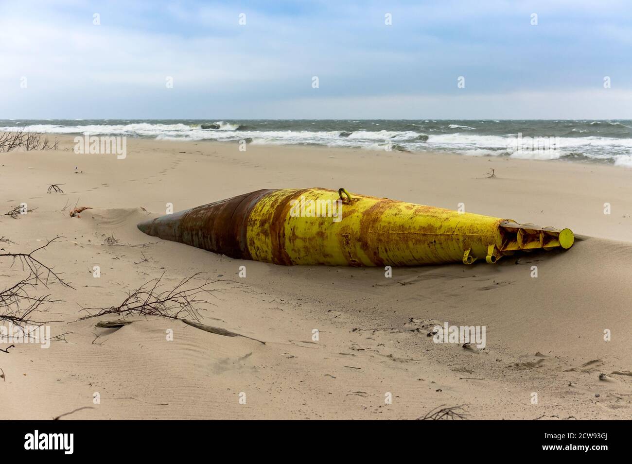 old iron float on the shore, sea buoy made of iron Stock Photo - Alamy