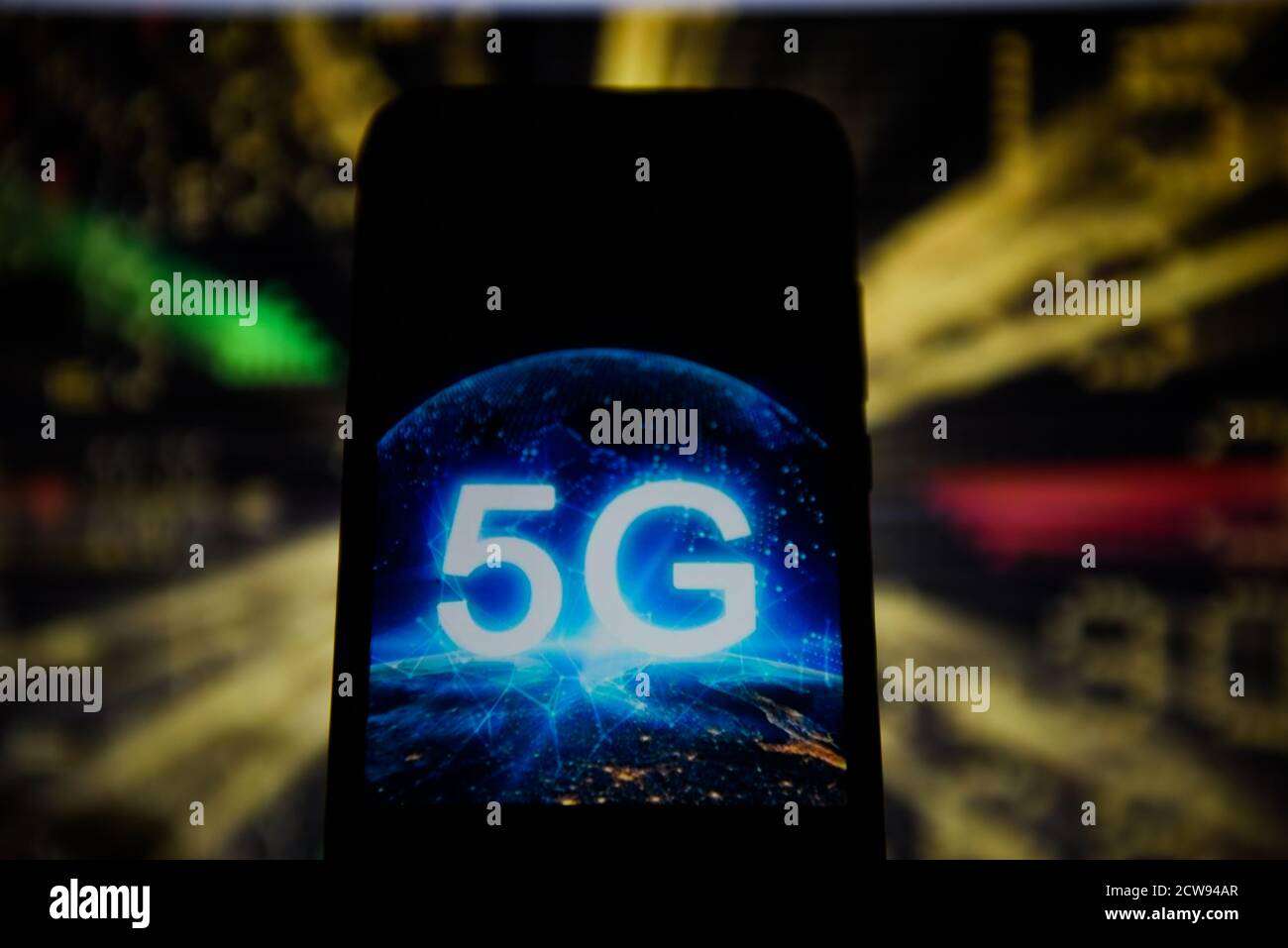 In this photo illustration a 5G logo is seen displayed on a smartphone ...