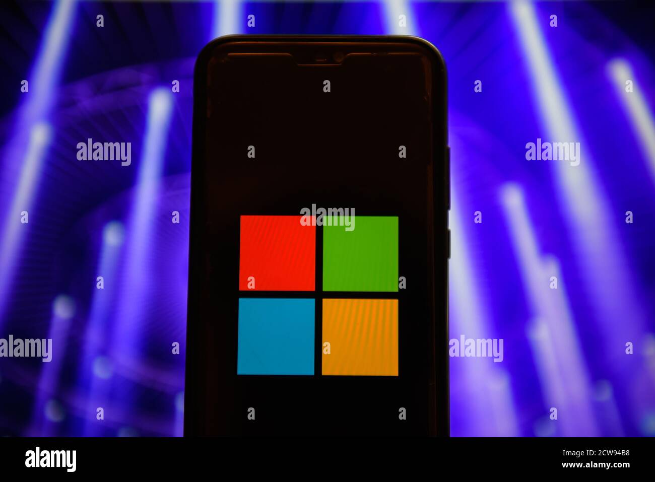 In this photo illustration a Microsoft logo is seen displayed on a ...