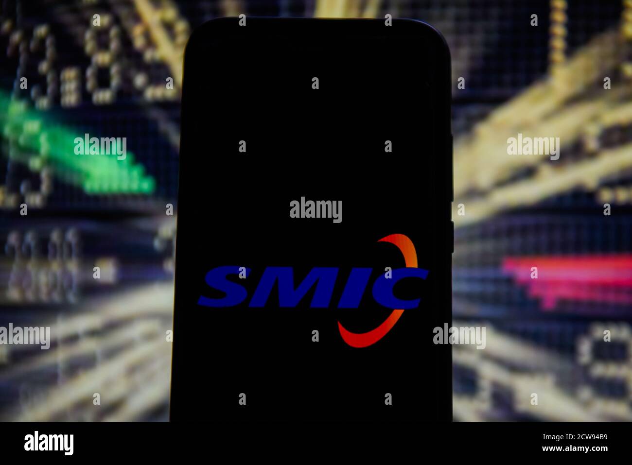 In this photo illustration a SMIC logo is seen displayed on a ...
