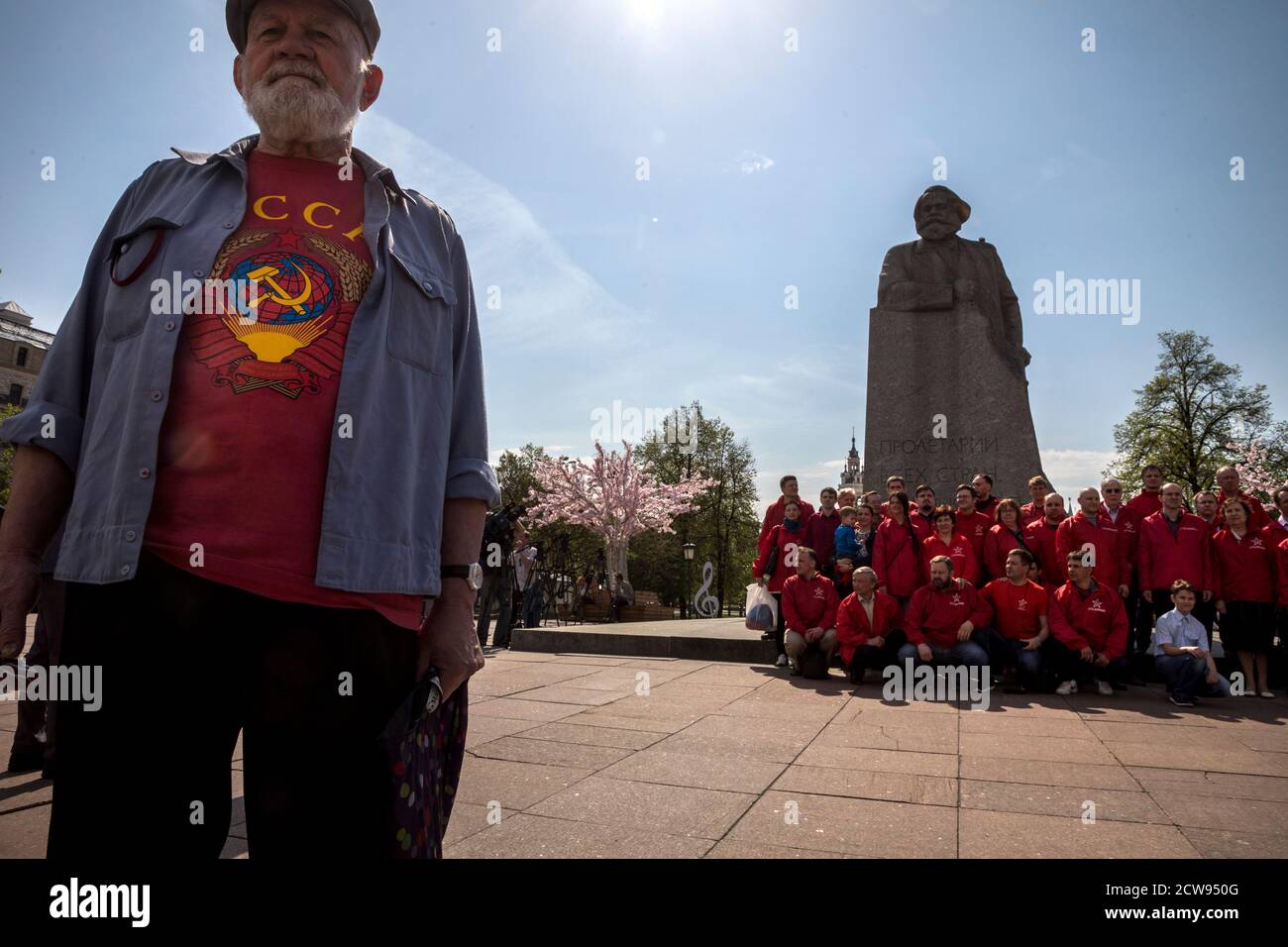 Moscow, Russia. 5th of May, 2018 People hold a portrait of Karl Marx ...
