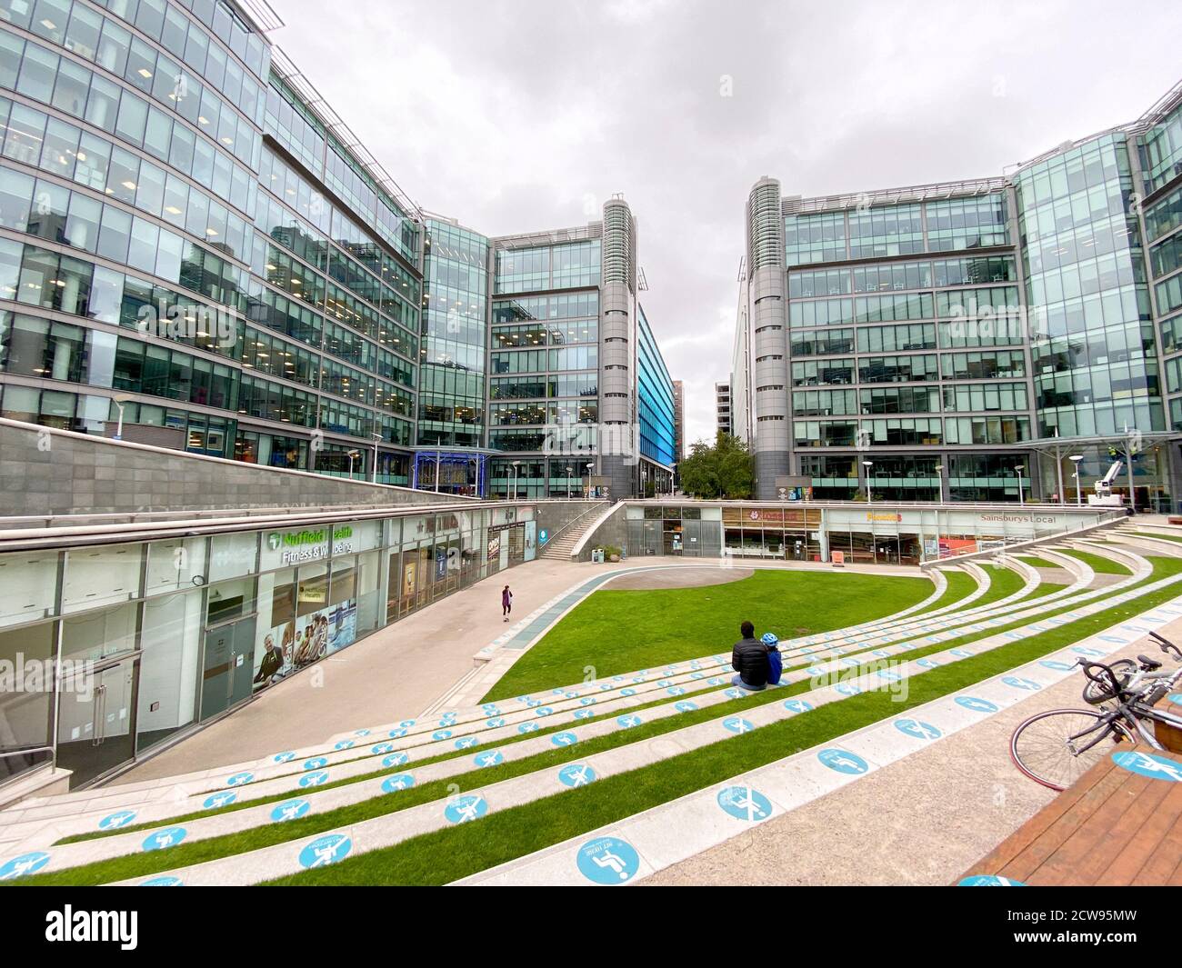 Social distancing signs at Sheldon Square Amphitheatre in Paddington ...