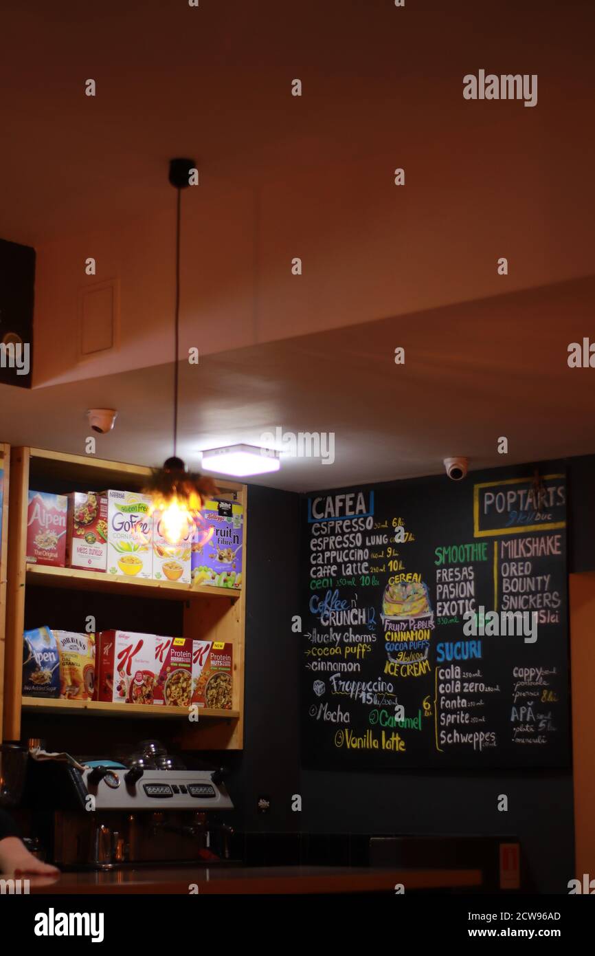 Types of Cereals on display in a coffee shop, milk and cereal shop ...