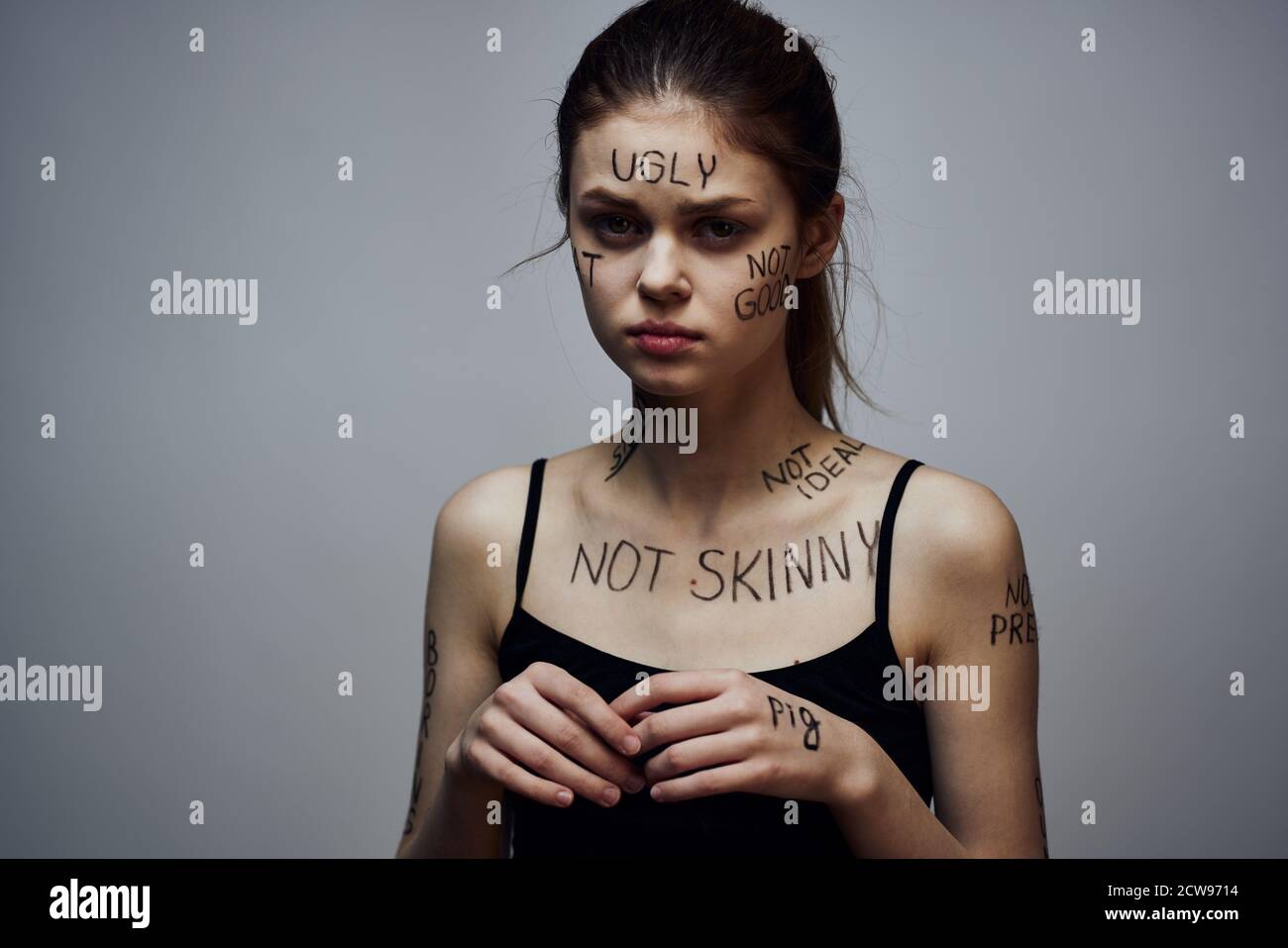 Woman with inscriptions on the body frustration and dissatisfaction ...