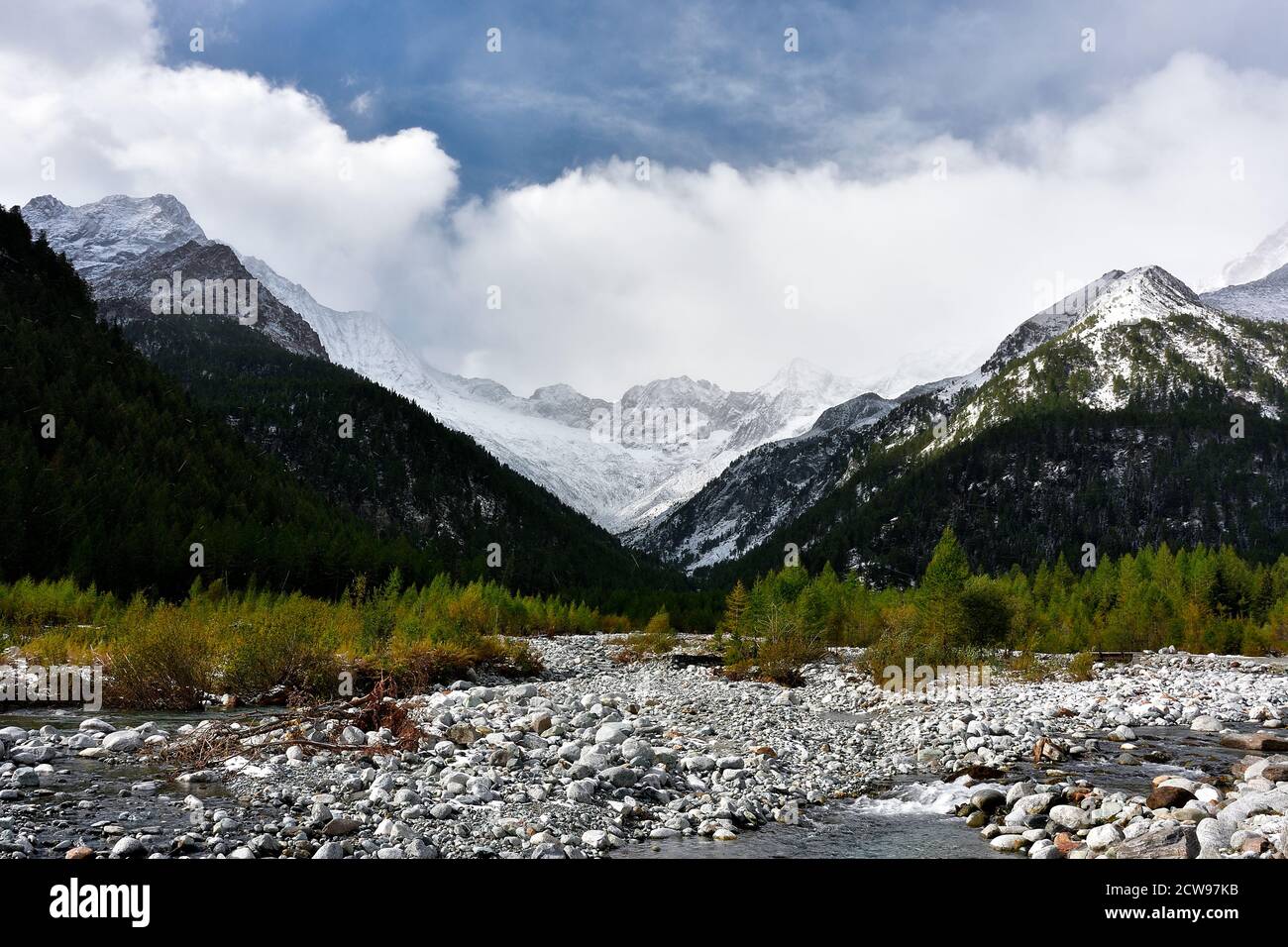 Val Sissone in early autumn, when the first snow surprise the larches ...