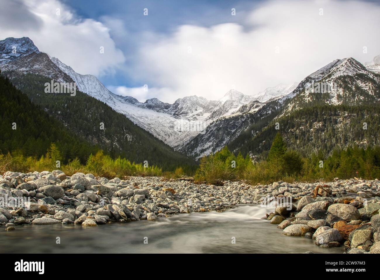 Val Sissone in early autumn, when the first snow surprise the larches ...