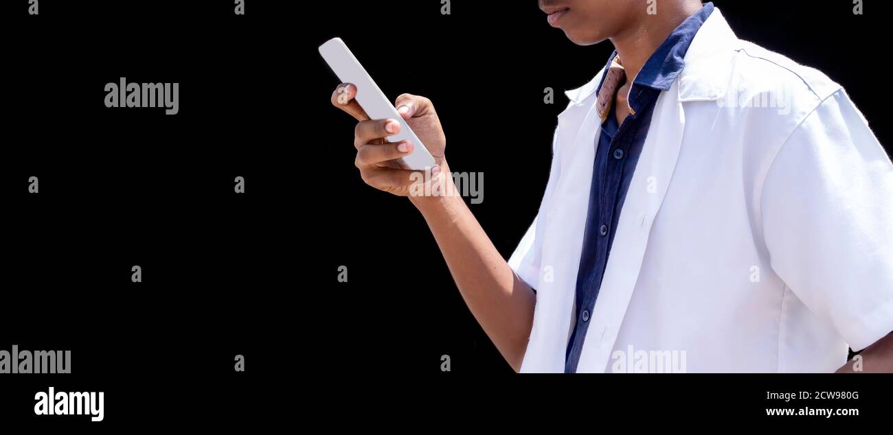 Doctor using mobile smart phone isolated on black backgrounds Stock ...