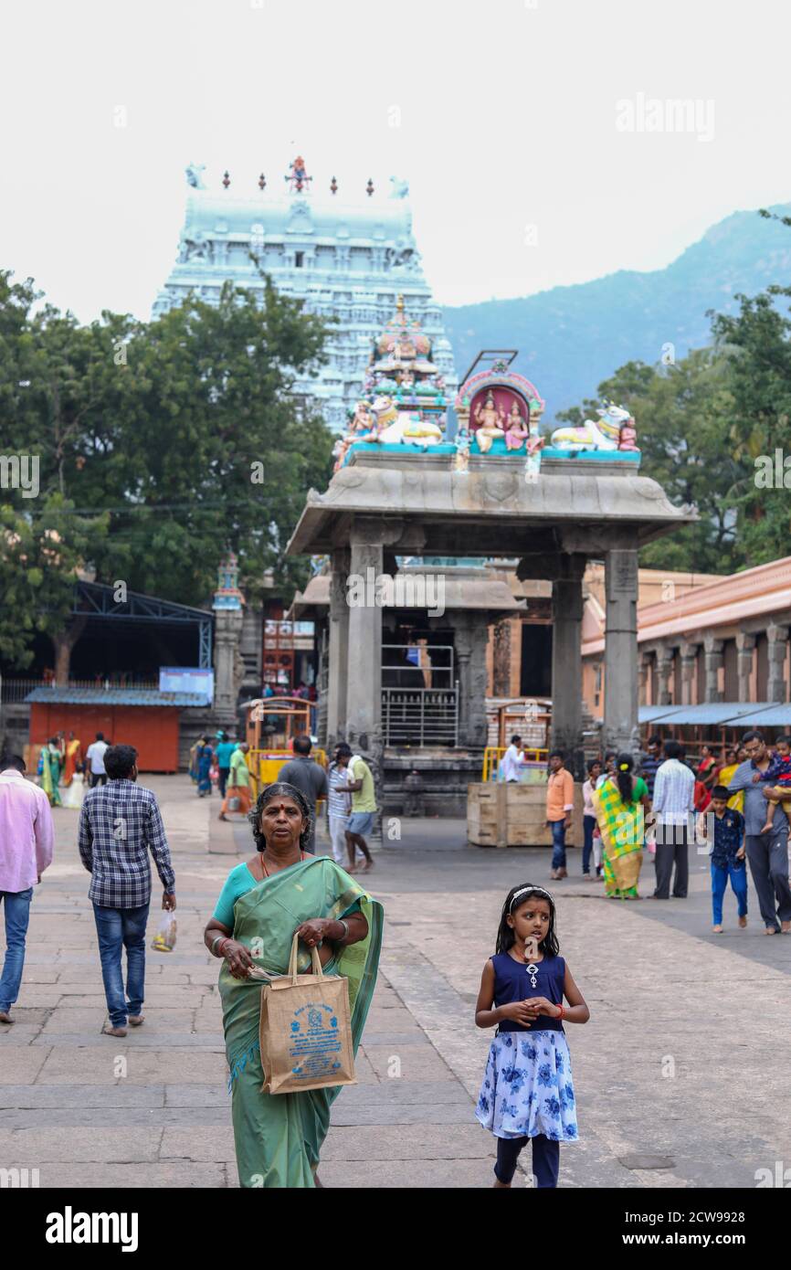 Indian devotees at Arunachaleswarar Temple in India. People praying at ...