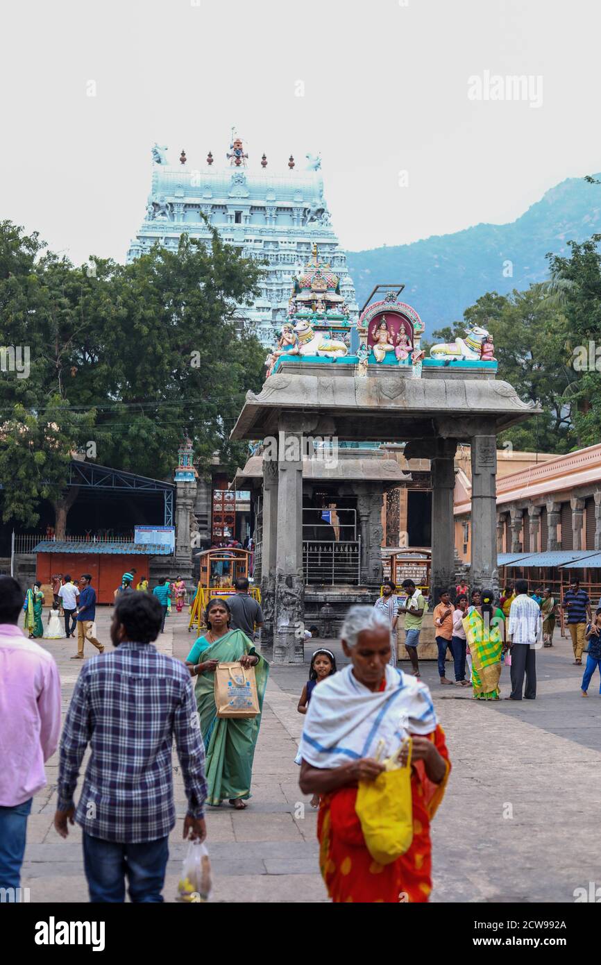 Indian devotees at Arunachaleswarar Temple in India. People praying at ...