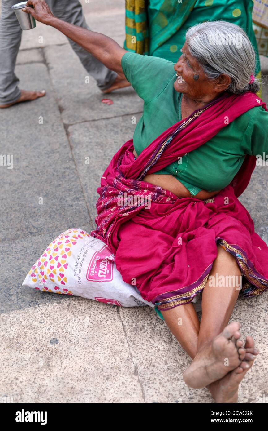 Female Beggars Sitting Outside a Temple Stock Photo - Alamy