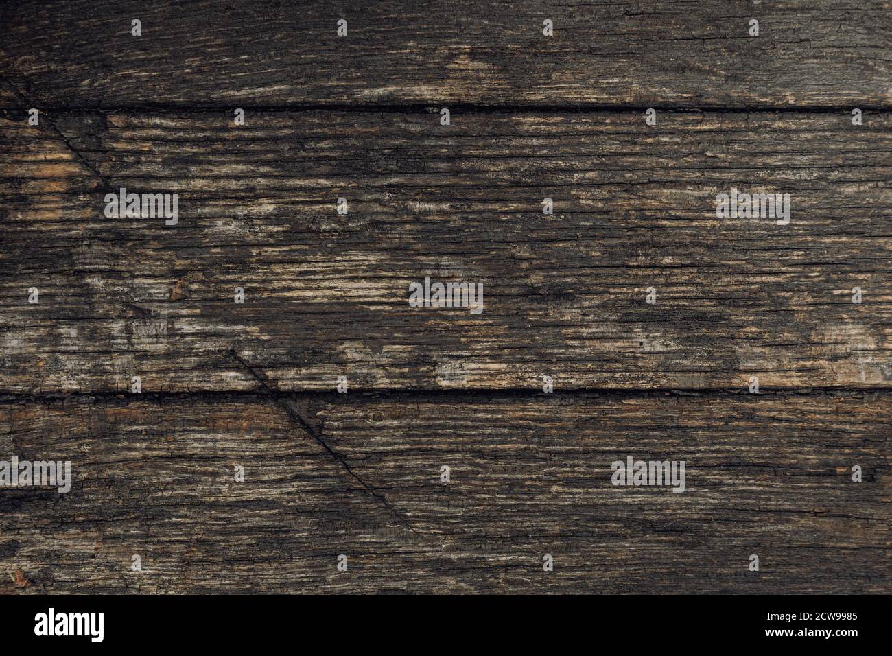 Close-up old vintage dark rough hardwood natural wooden surface ...