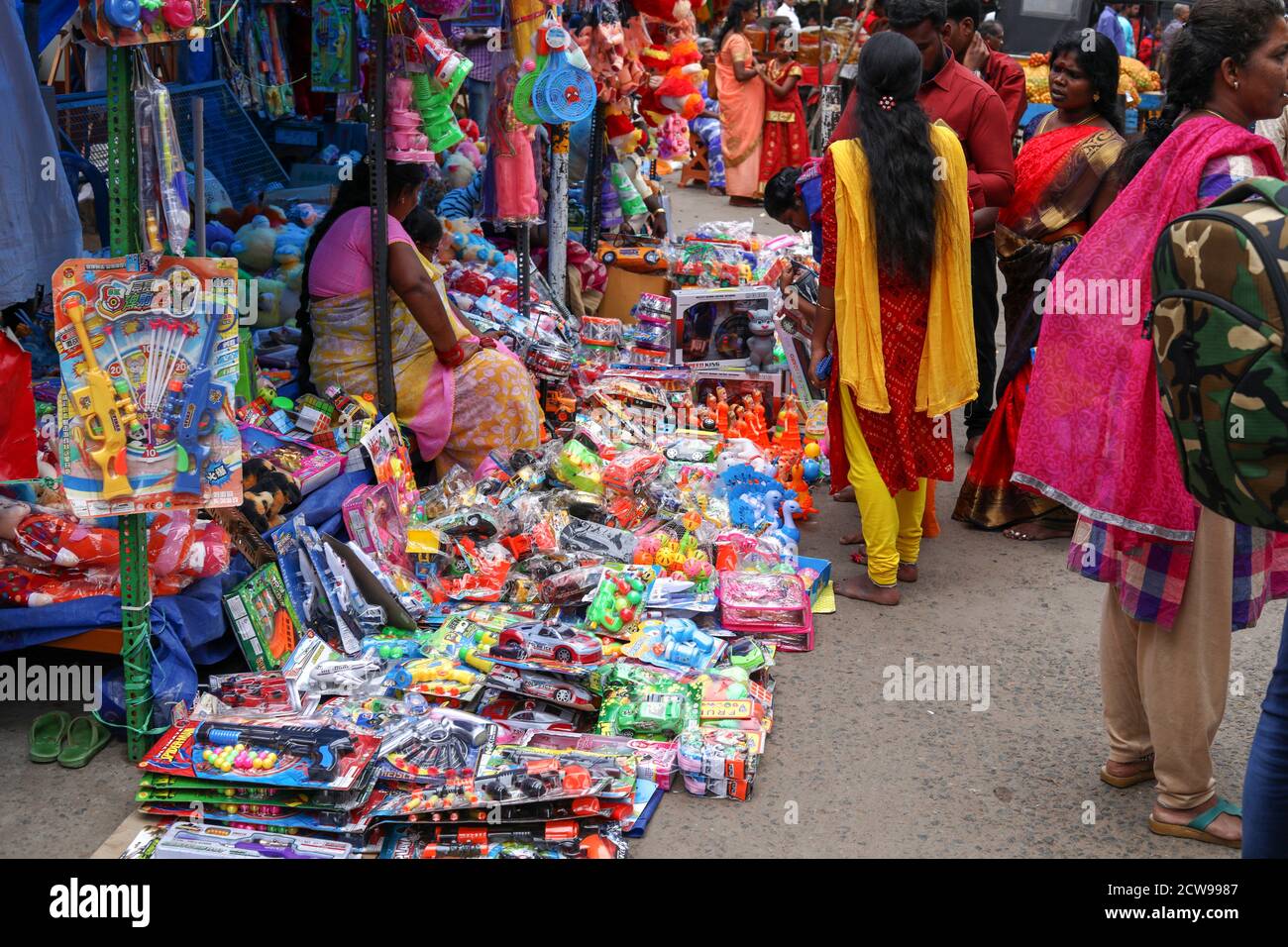 street vendor sells colorful toys Stock Photo - Alamy