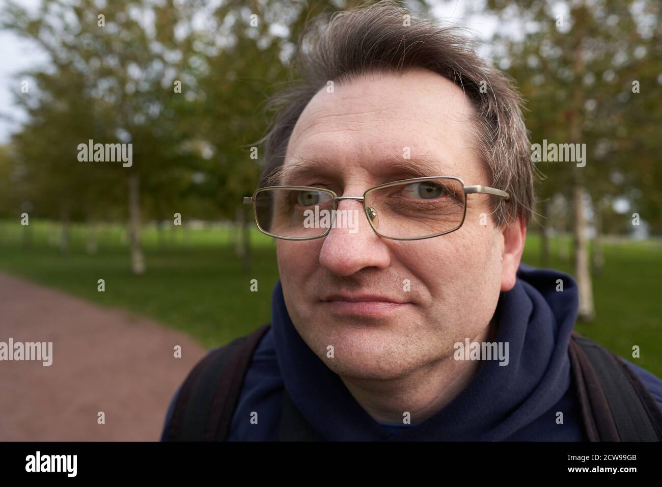 Portrait of a man with visual impairment, exotropia, visual impairment ...