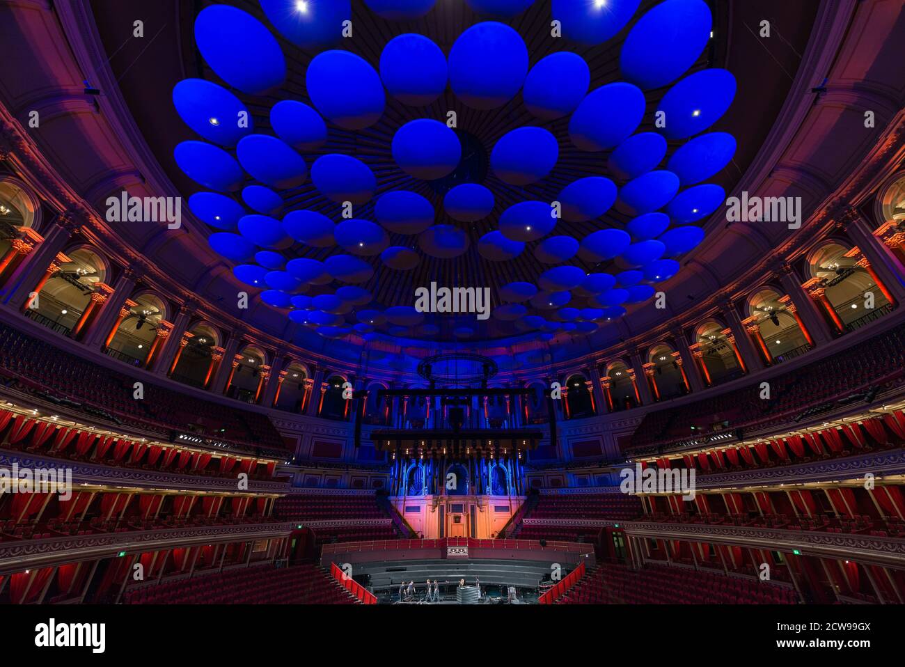 Acoustic diffusing discs (lit in purple) hanging from the roof of the ...