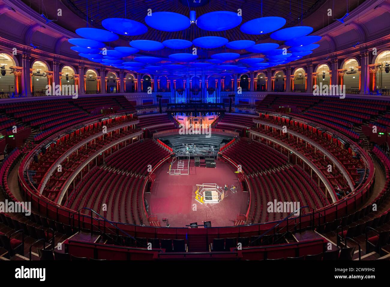Acoustic diffusing discs (lit in purple) hanging from the roof of the ...
