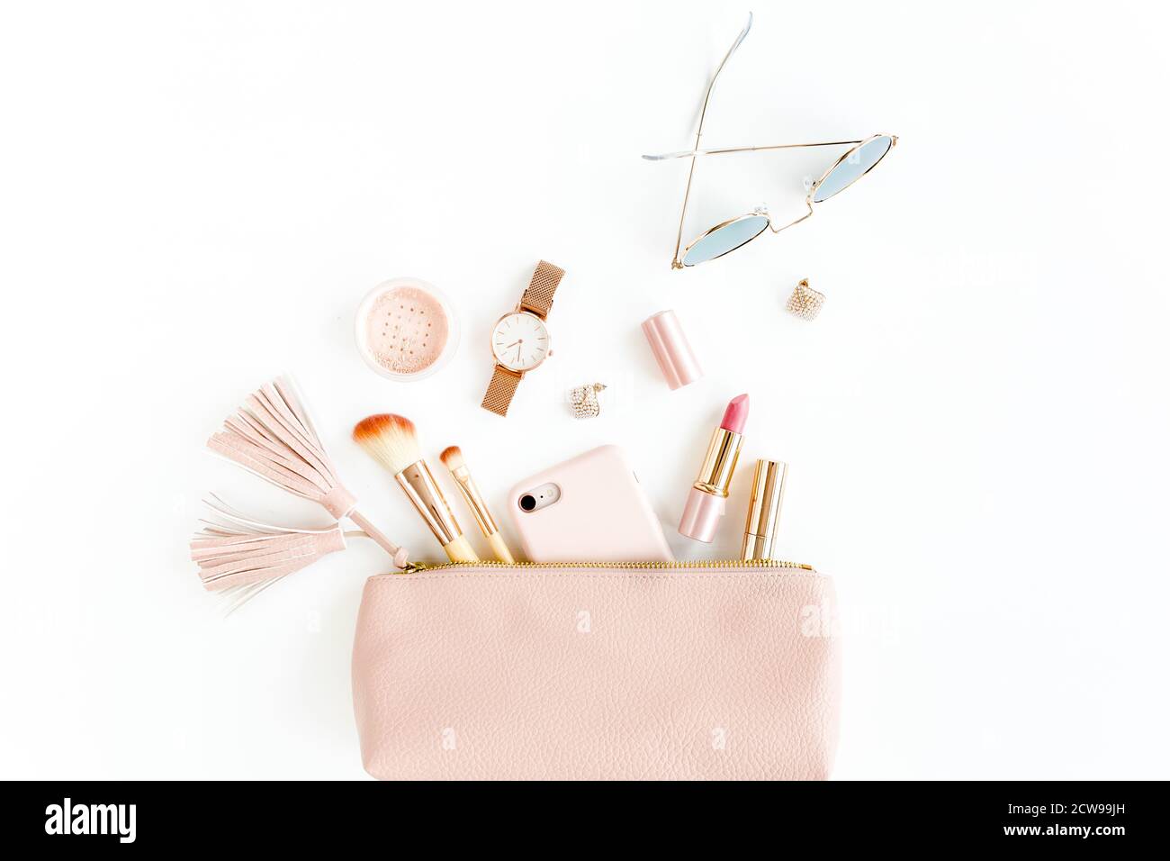 Flat lay composition with pink cosmetic bag with cosmetic makeup ...