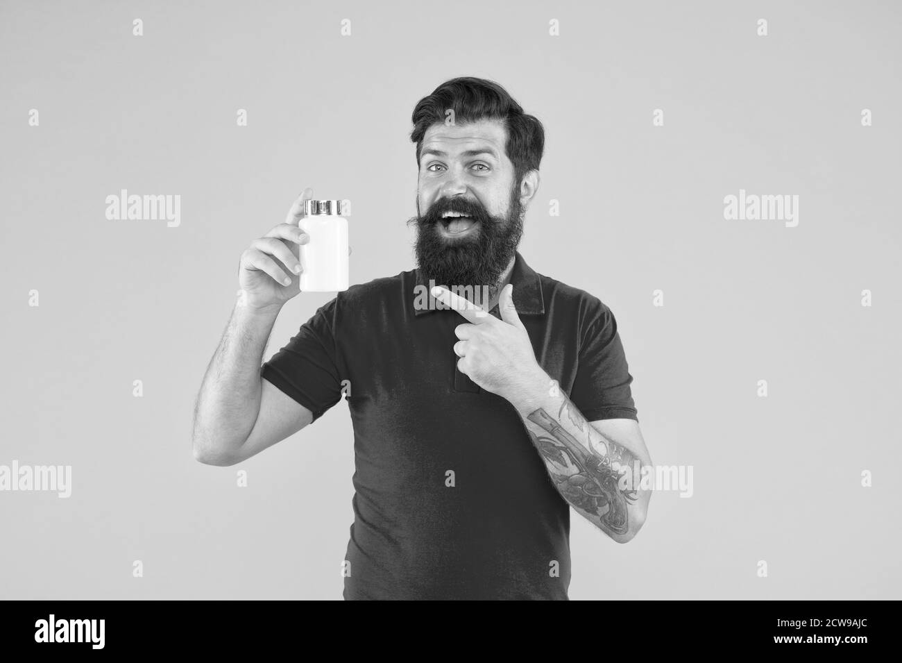 Vitamin complex. Handsome bearded man take medication. Health care ...