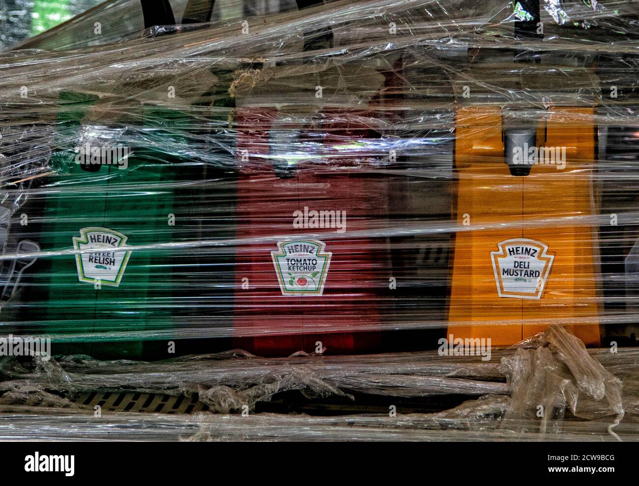 Condiments wrapped up in a closed snack bar in a closed baseball ...
