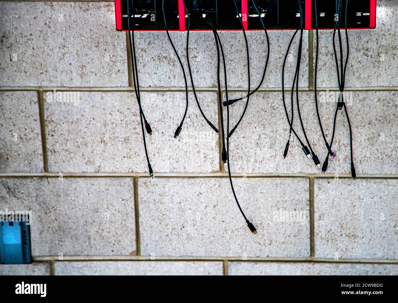 Cellphone charging station unused in a closed to fans baseball stadium ...