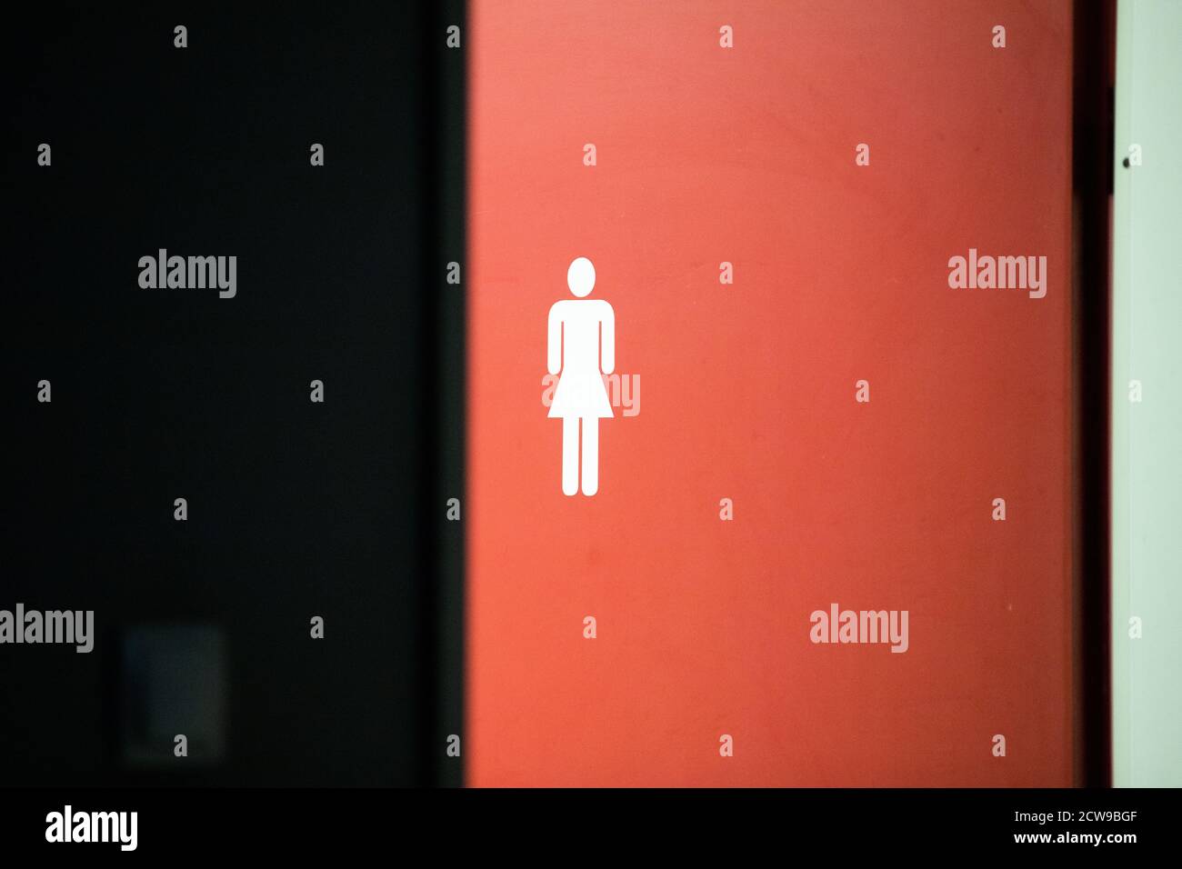 women's toilet sign on red Stock Photo - Alamy
