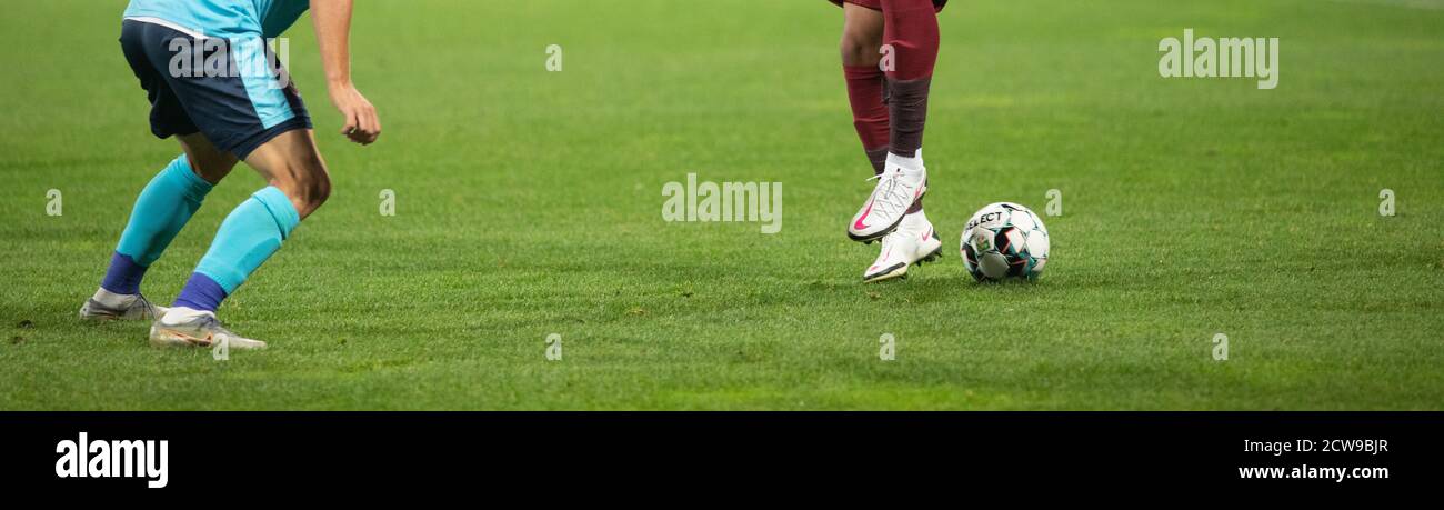 soccer game background player kicking football Stock Photo - Alamy