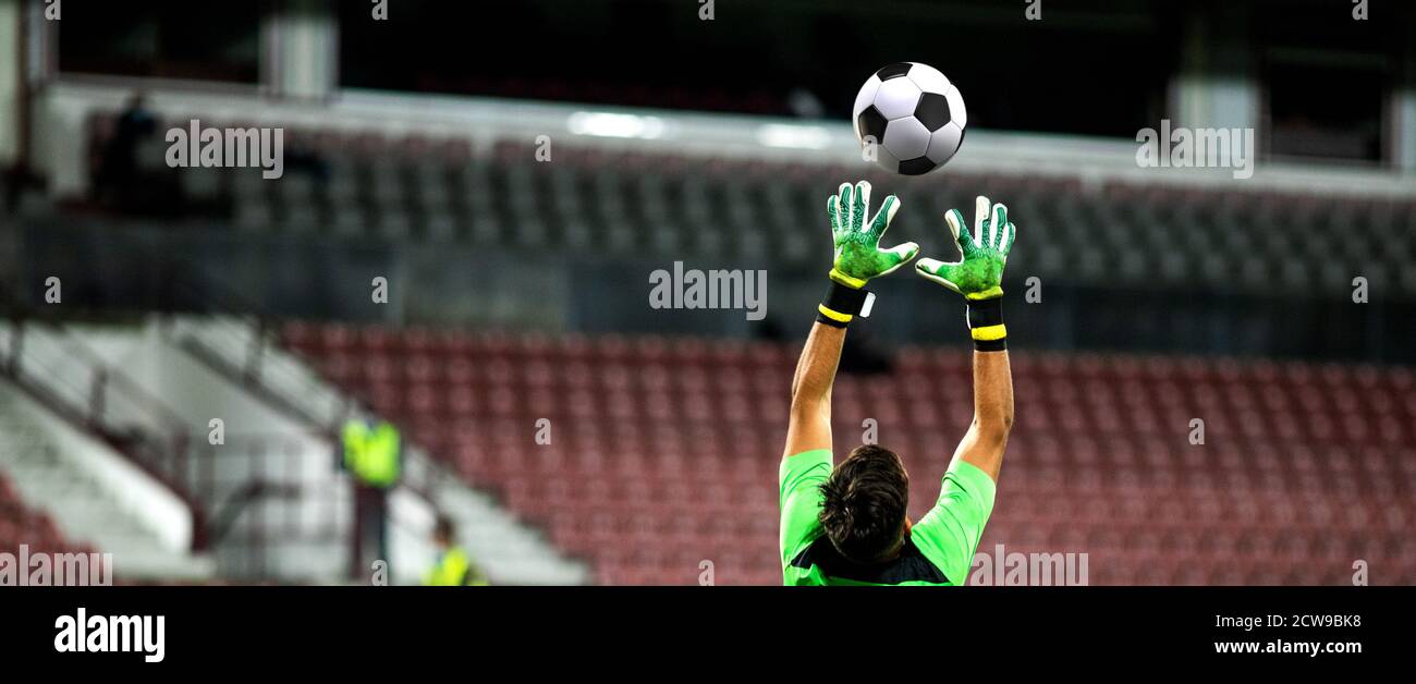 soccer game background goalkeeper catching football Stock Photo - Alamy
