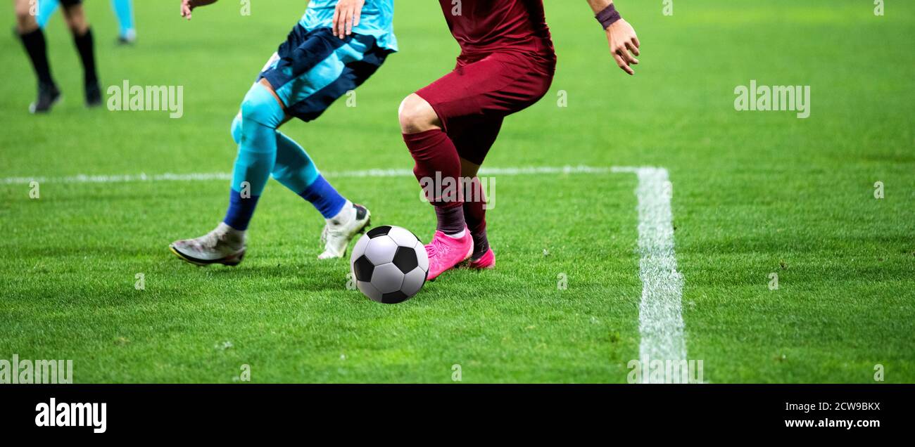 soccer game background player kicking football Stock Photo - Alamy