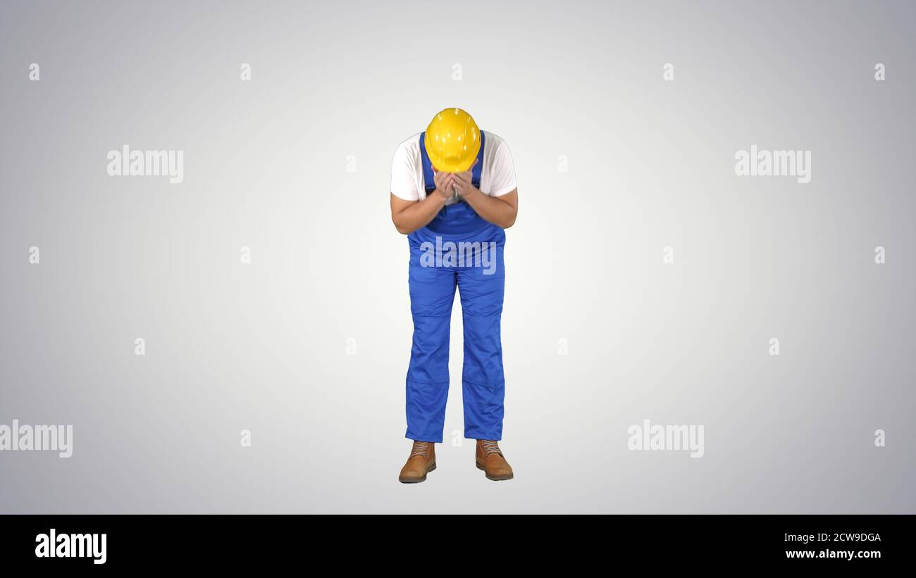 Architect construction worker sneeze on gradient background Stock Photo ...