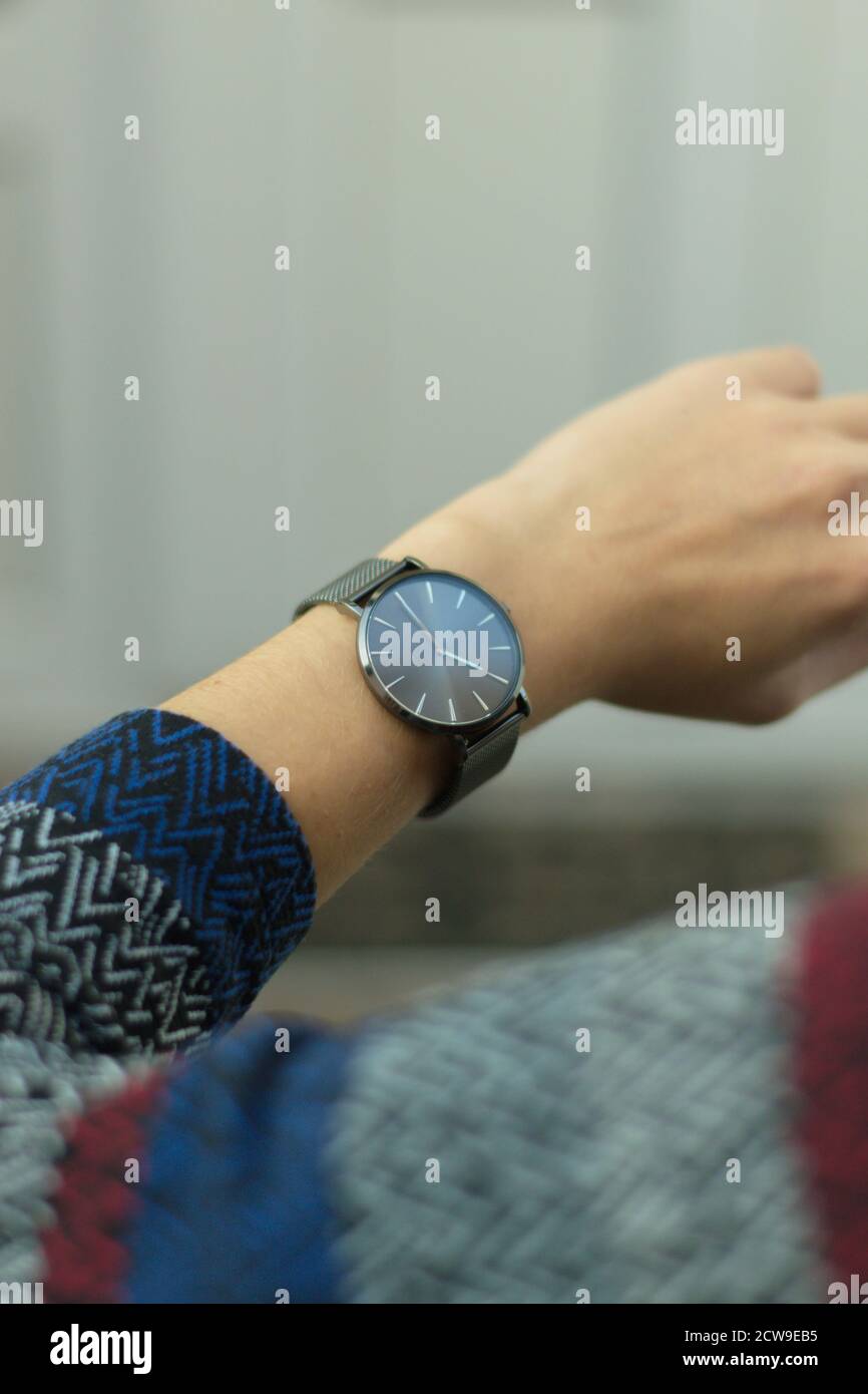 Vertical closeup shot of a female hand with a watch Stock Photo - Alamy