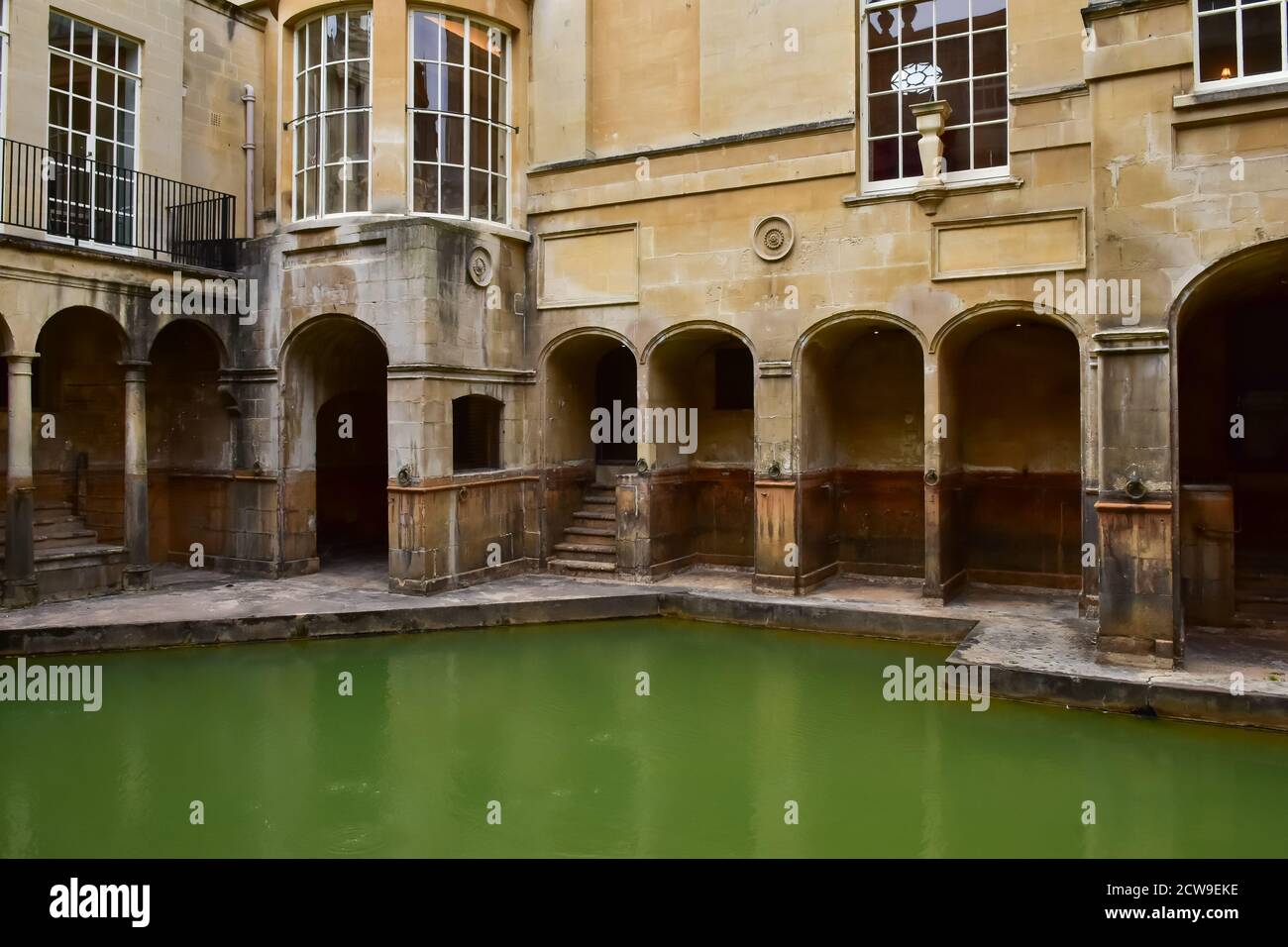 The Sacred Pool at Roman Baths in the city of Bath, England Stock Photo ...