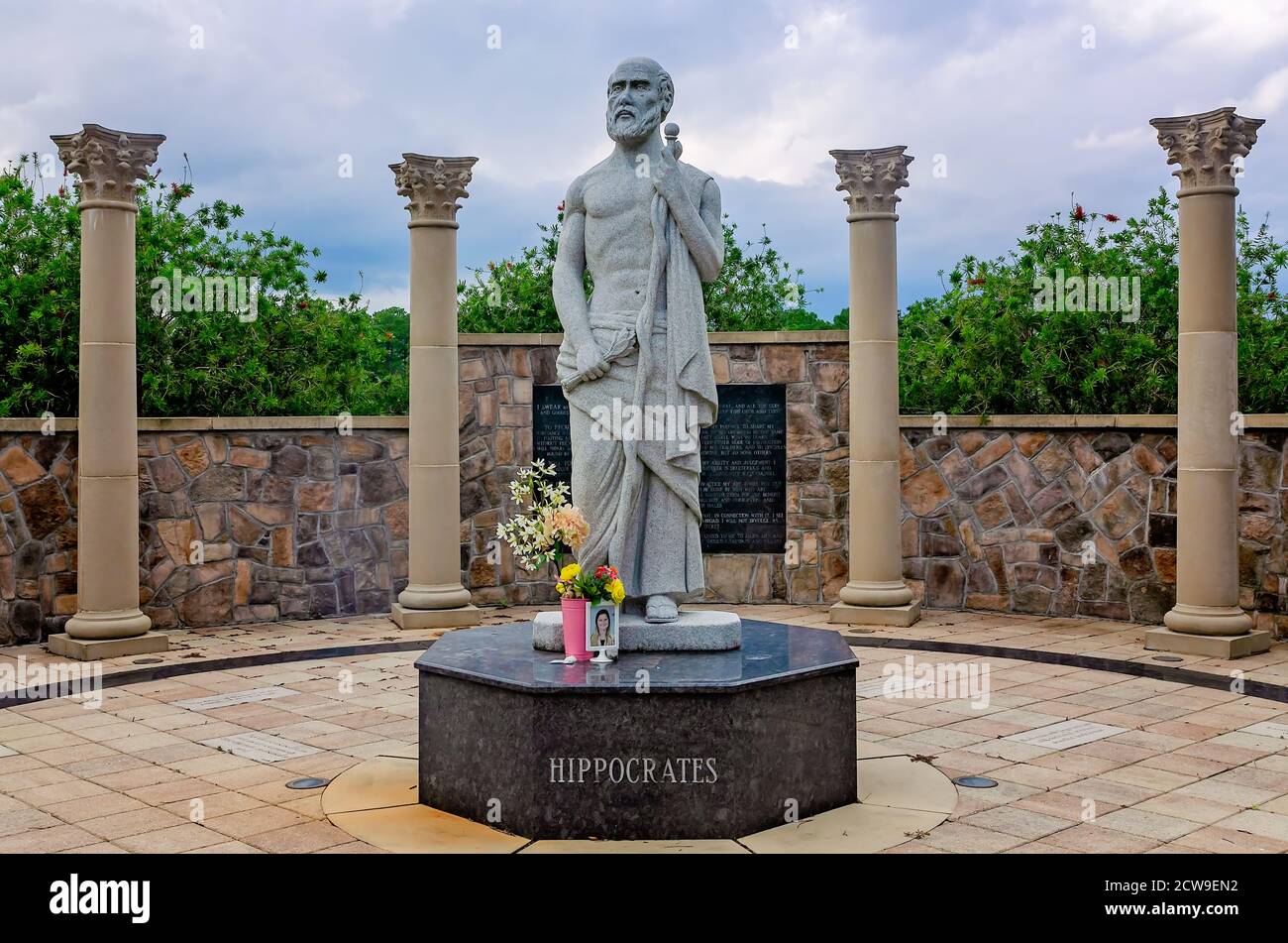 A statue of Hippocrates stands in Hippocrates Park on the campus of the ...