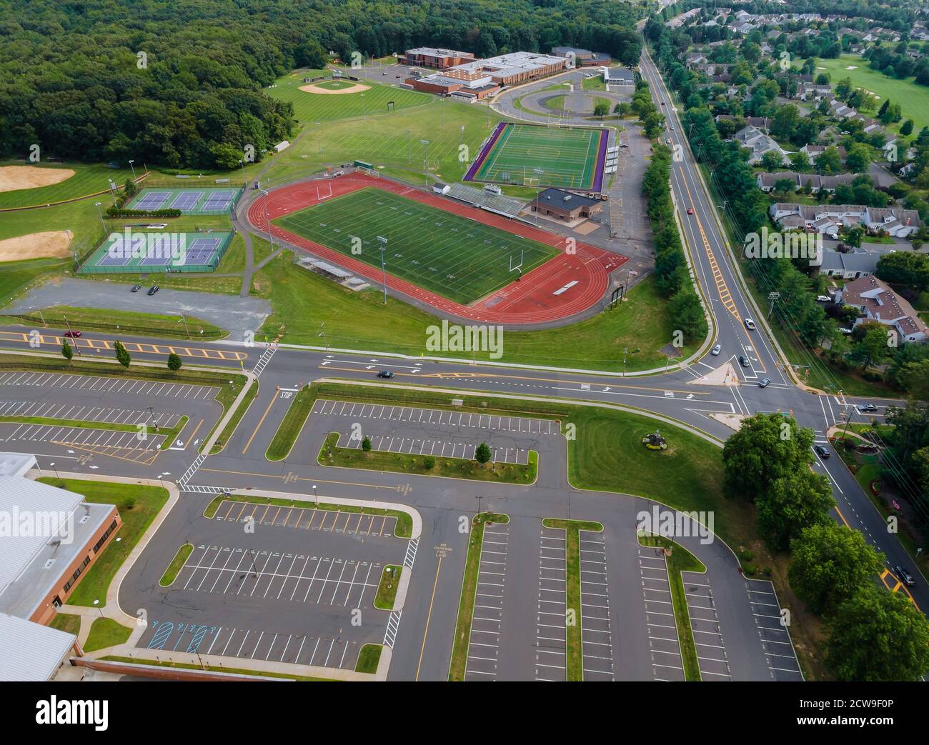 Aerial view of empty stadium with basketball field and training ground ...