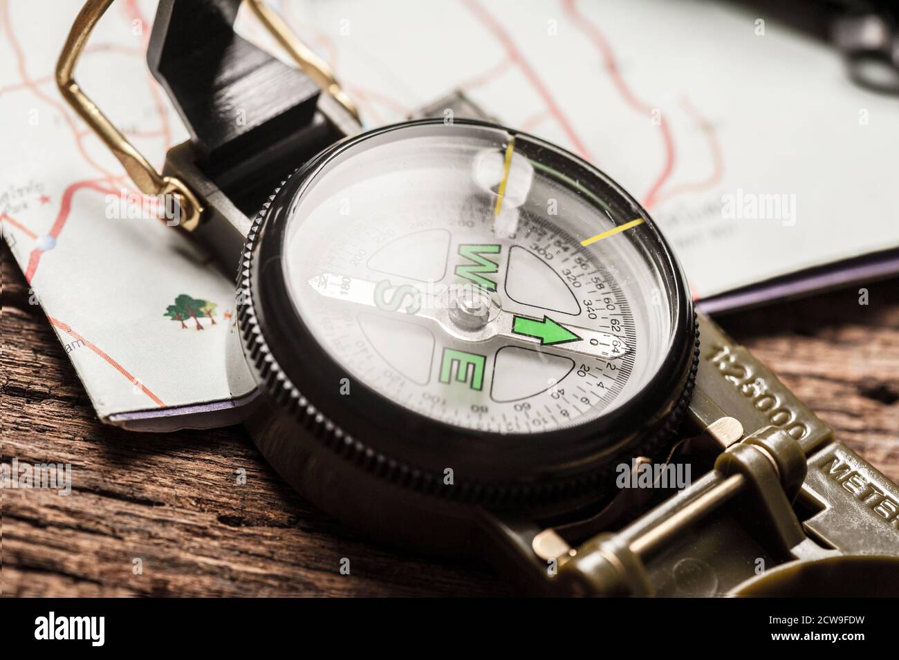 closeup military style of compass for military or camping Stock Photo ...