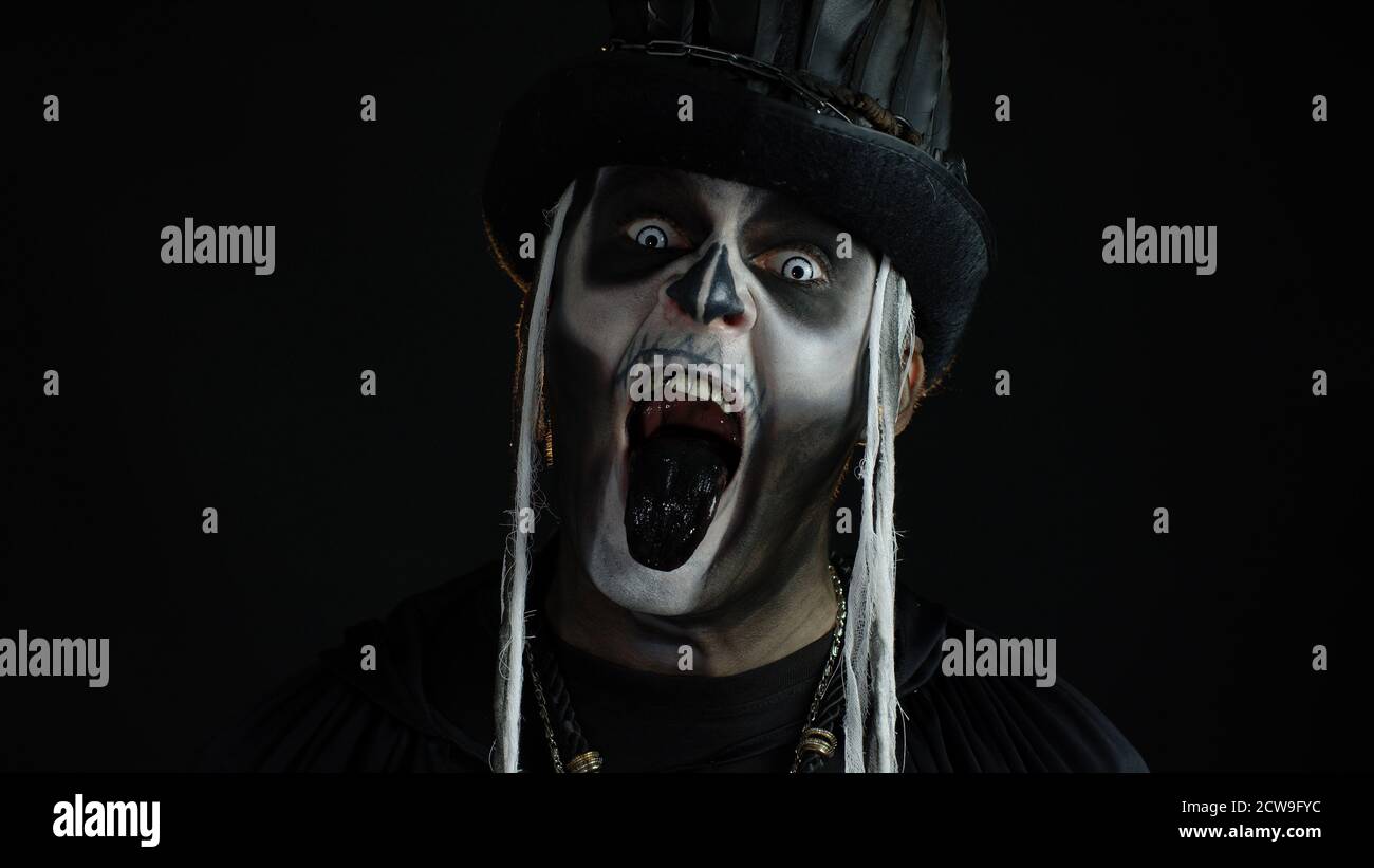 Frightening man in skeleton Halloween cosplay costume. Fashion art ...