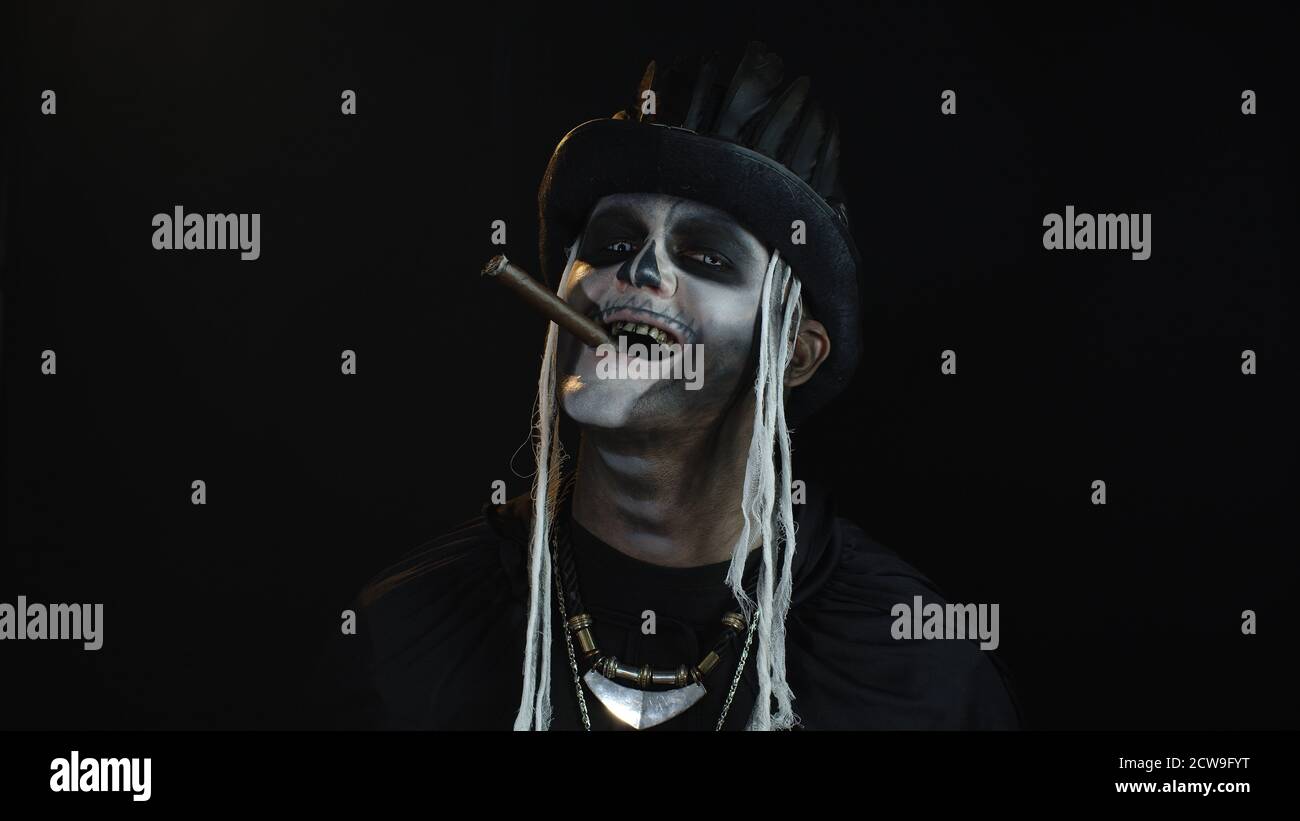 Frightening man in skeleton Halloween cosplay costume. Crazy guy in ...