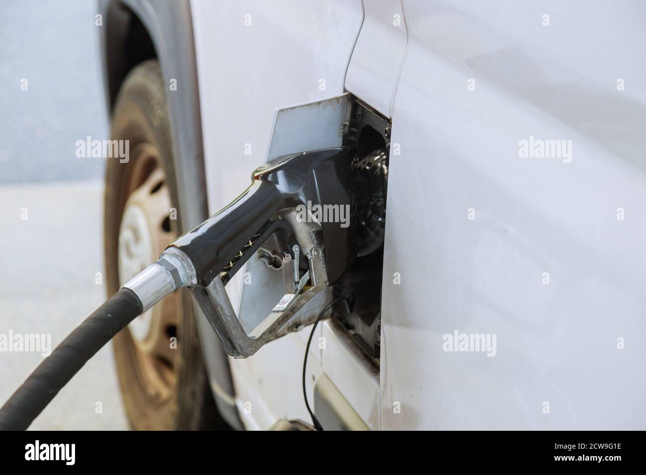 Car gas station being filled hi-res stock photography and images - Alamy